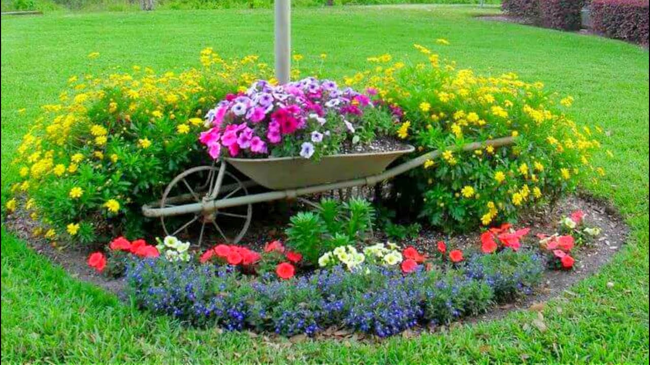 15 DIY Wheelbarrow Repurposing Ideas